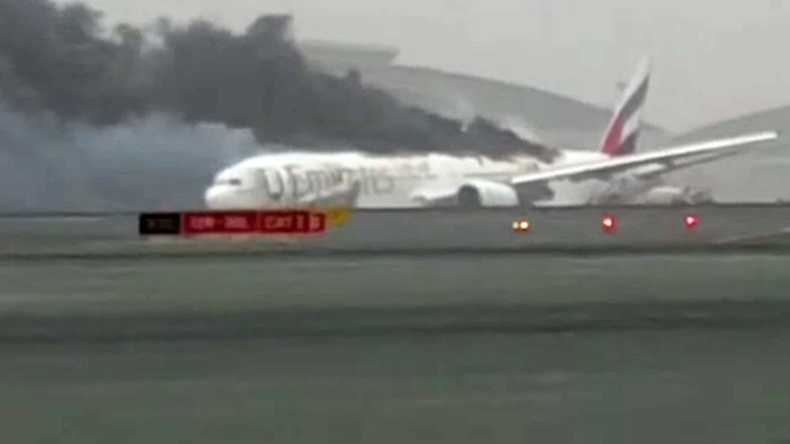 Raw footage shows confusion, fear inside smoke-filled Emirates plane ...