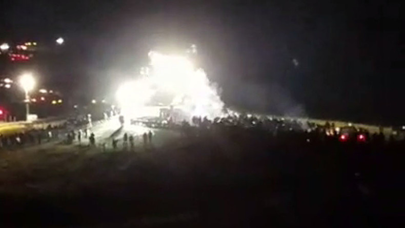 400 DAPL protesters ‘trapped on bridge’ as police fire tear gas, water ...