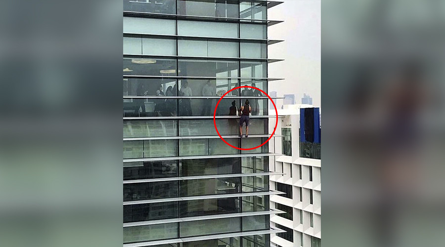 Russian ‘spiderman’ handcuffed by cops after scaling Mexican skyscraper ...