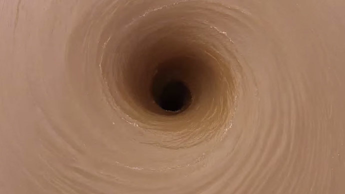 'May suck in a boat': Giant vortex in southern US lake wows onlookers ...