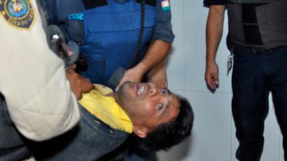 30 dead, 60 injured in Bolivian prison riot — RT News